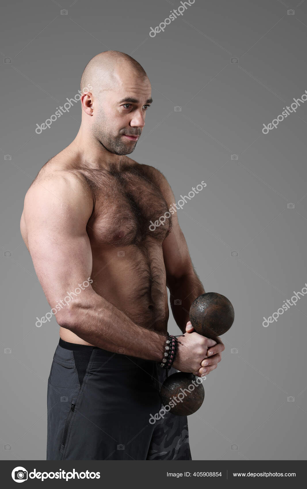 Bodybuilder Man Muscular Body Stock Photo by ©racool_studio 405908854