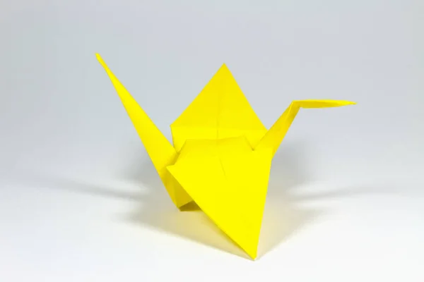 yellow Origami Bird on white background - Stock Image - Everypixel