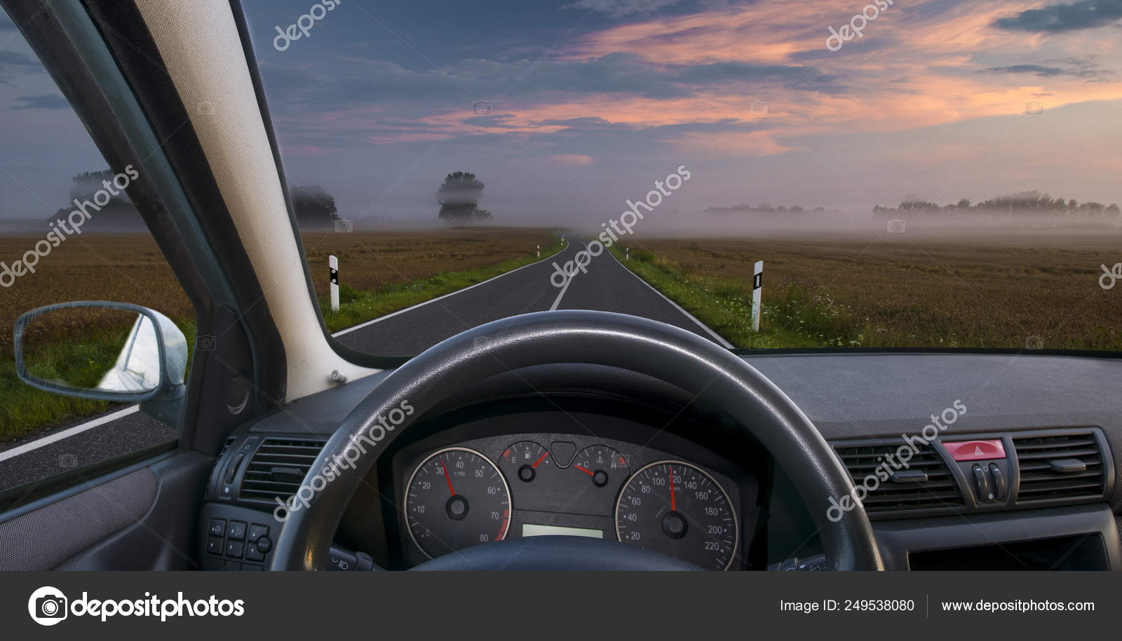 A view of the cockpit of a car driving .The way in the morning Stock ...