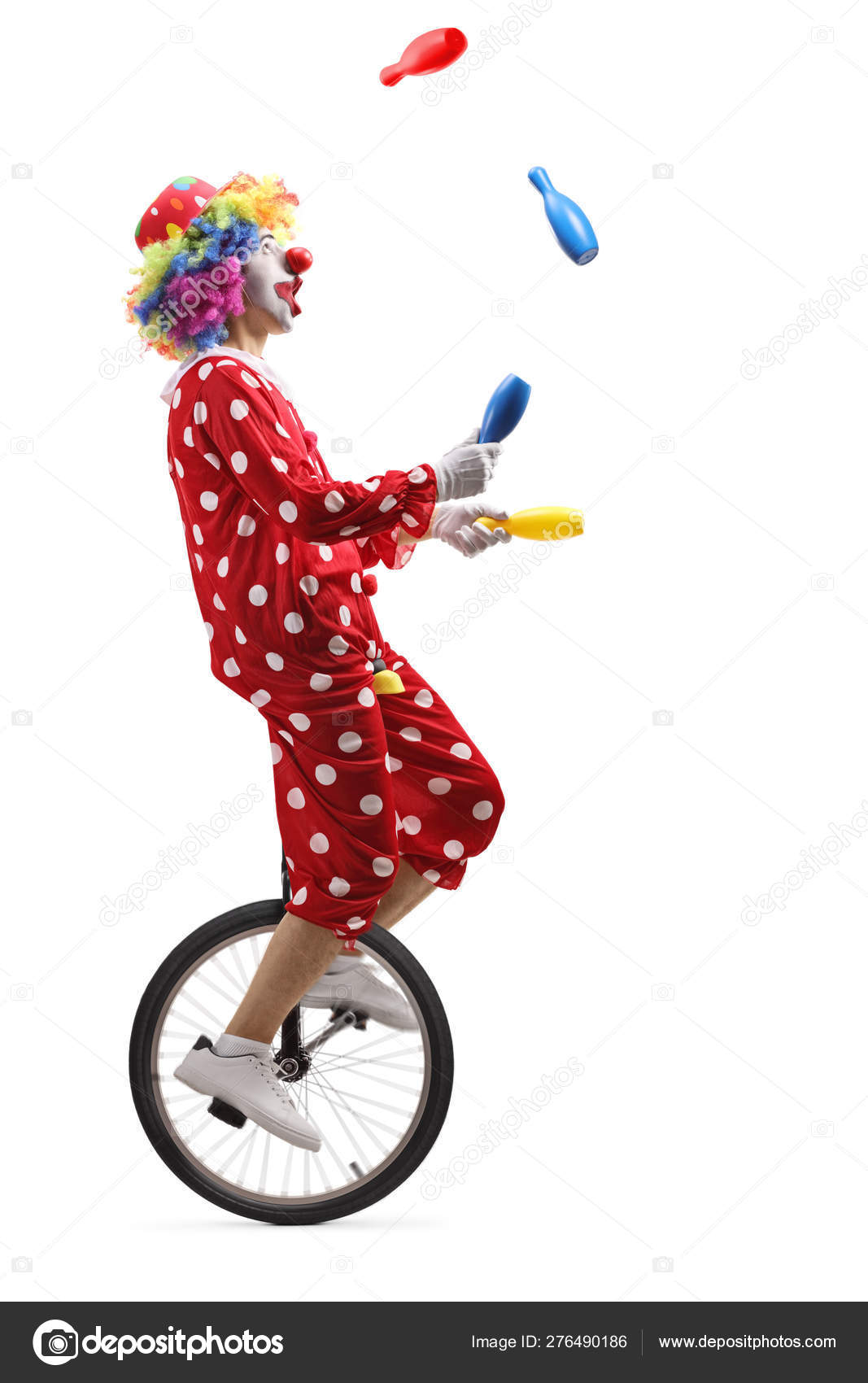 Clown on a unicycle juggling with clubs Stock Illustration by ©ljsphotography #276490186