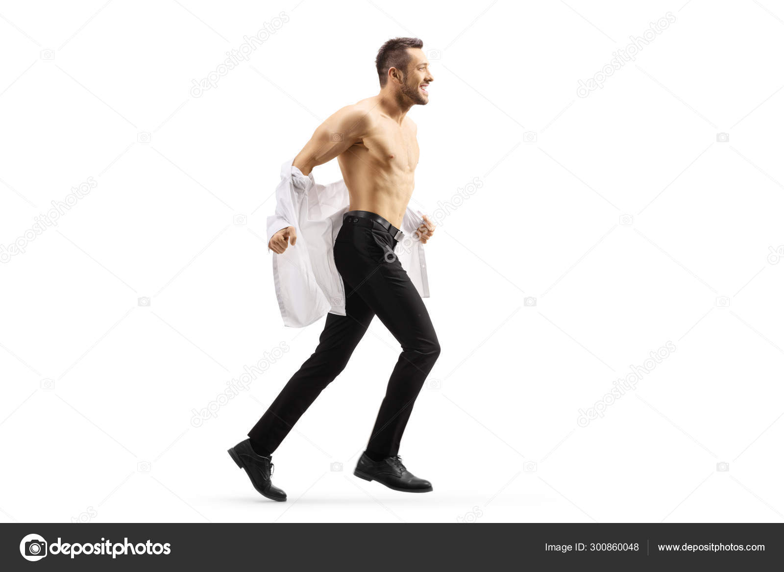 Young handsome man running and taking off his shirt — Stock Photo ...