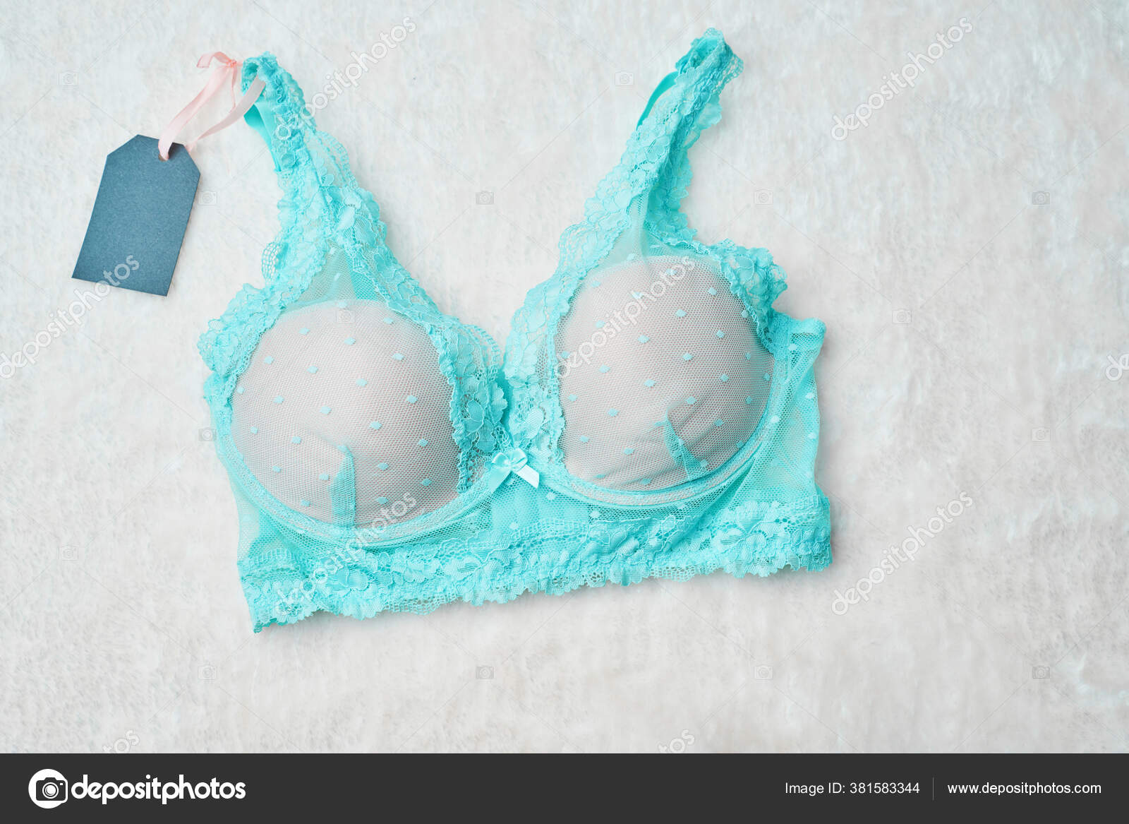Turquoise female bra in underwear store. — Stock Photo © nuclear_lily ...