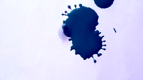 Blue ink abstract stains flow on a white surface. — Stock Video ...