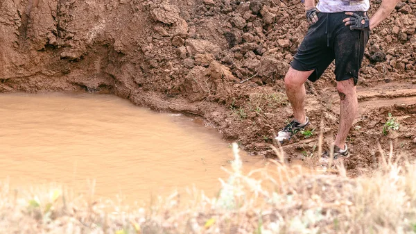 Person in mudhole Stock Photos, Royalty Free Person in mudhole Images ...