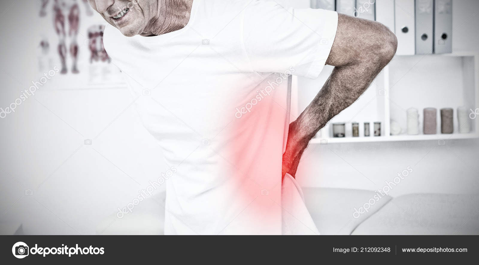 Highlighted Pain Suffering Patient Touching His Back Stock Photo by ...
