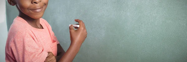 Thoughtful Boy Standing Greenboard Classroom Stock Photo by ...