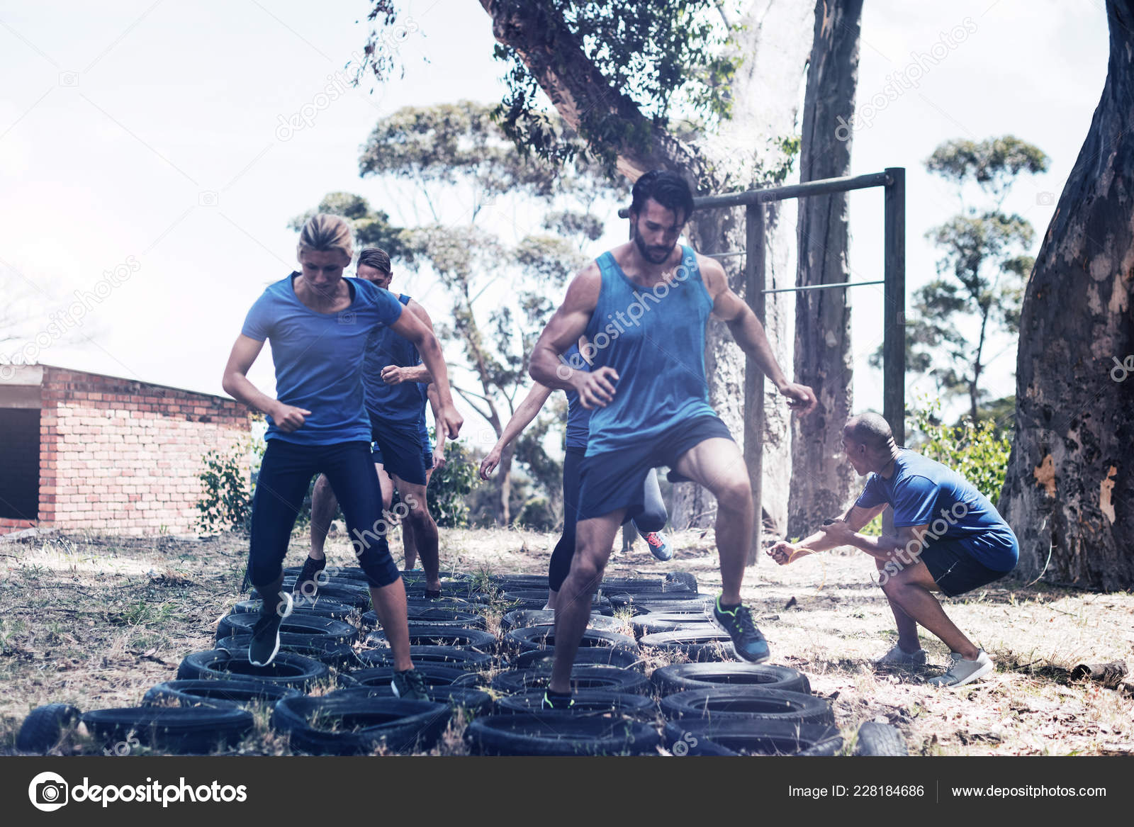 People Receiving Tire Obstacle Course Training Boot Camp ⬇ Stock Photo ...