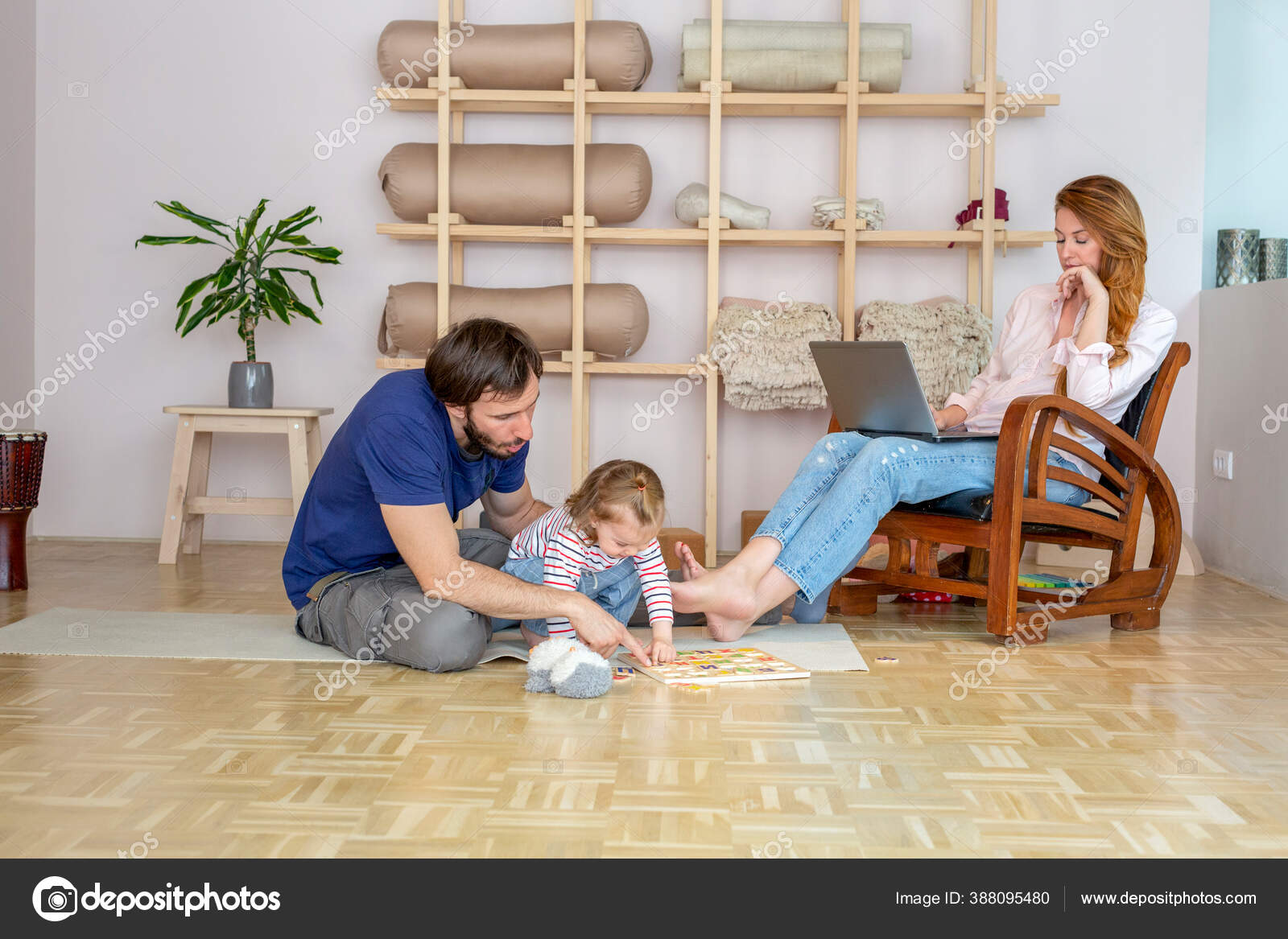 Mother Working Home Her Laptop While Her Daughter Playing Floor — Stock