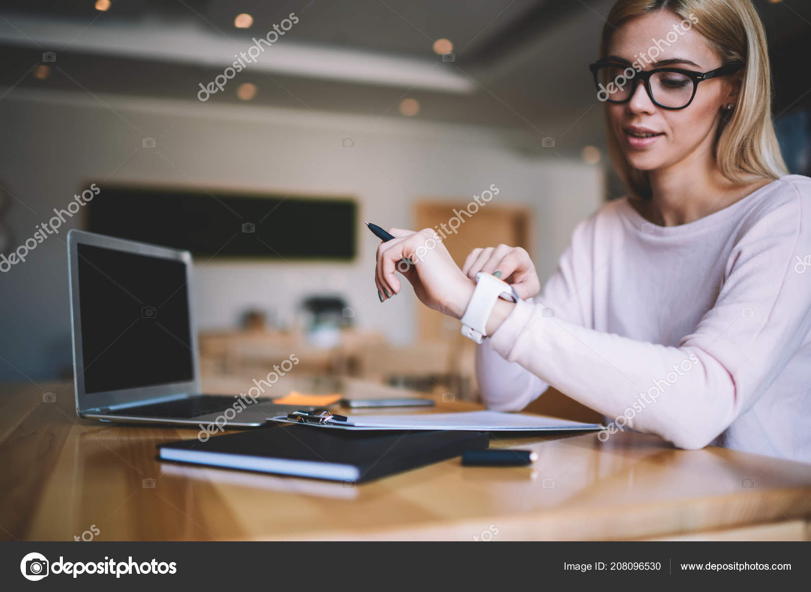 Beautiful Woman Looking Smartwatch Sitting Desk Modern Laptop Computer ...