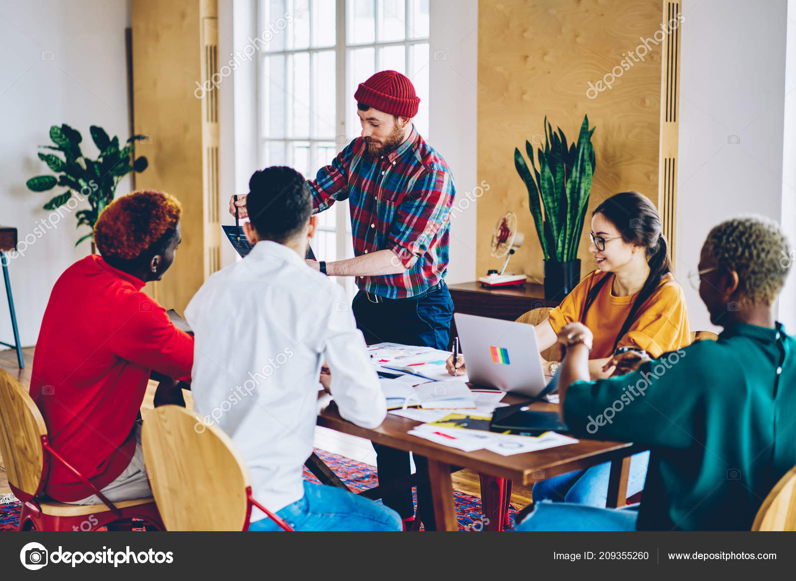 Leader Working Multiracial Team Explaining Strategy Ideas Project ...