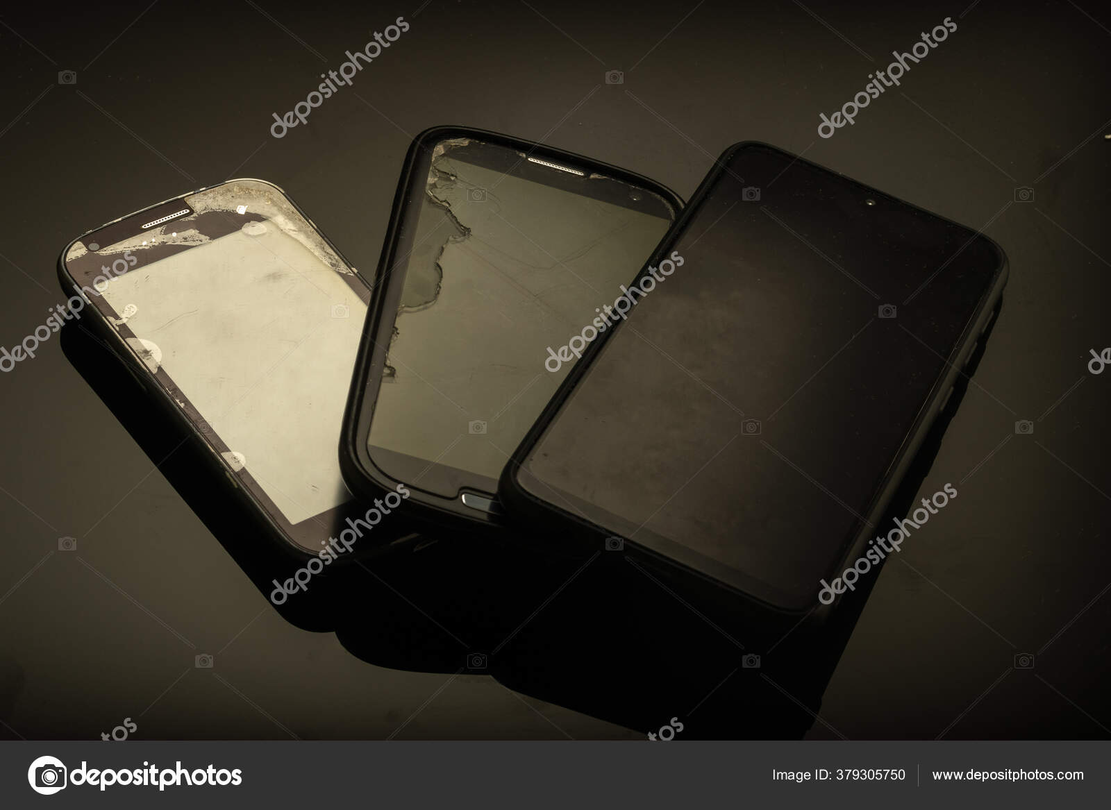 Three mobile phones, from the old model to the newer one. — Stock Photo ...