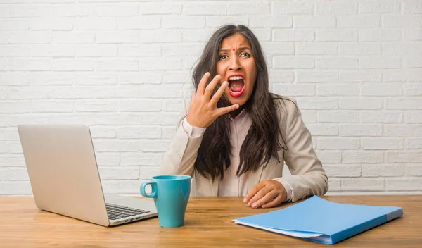Young indian woman at office scared and afraid - Stock Image - Everypixel