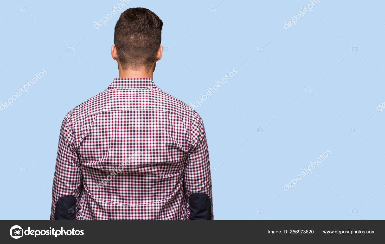 Young Cool Man Looking Back — Stock Photo © AsierRomeroCarballo #256973620