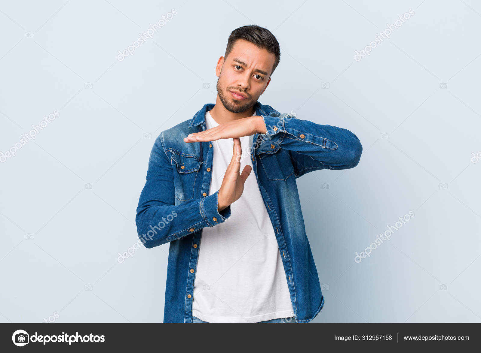 Young Handsome Filipino Man Showing Timeout Gesture Stock Photo by ...