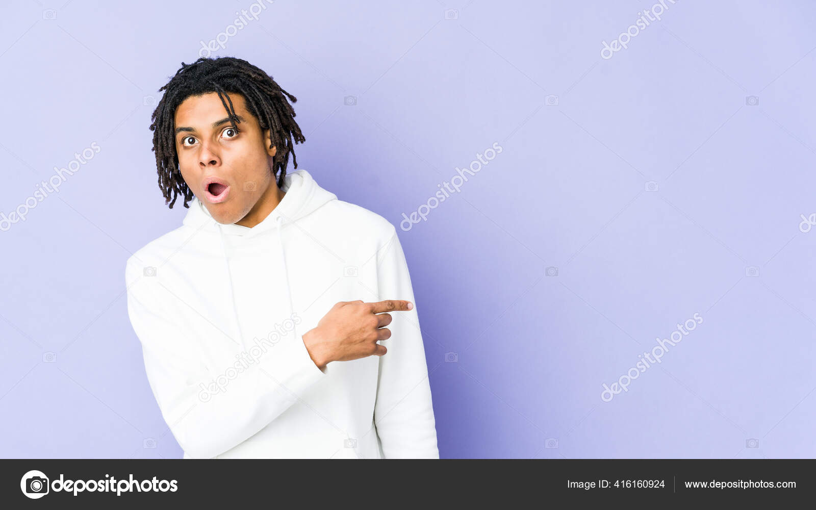 Young African American Rasta Man Smiling Pointing Aside Showing ...