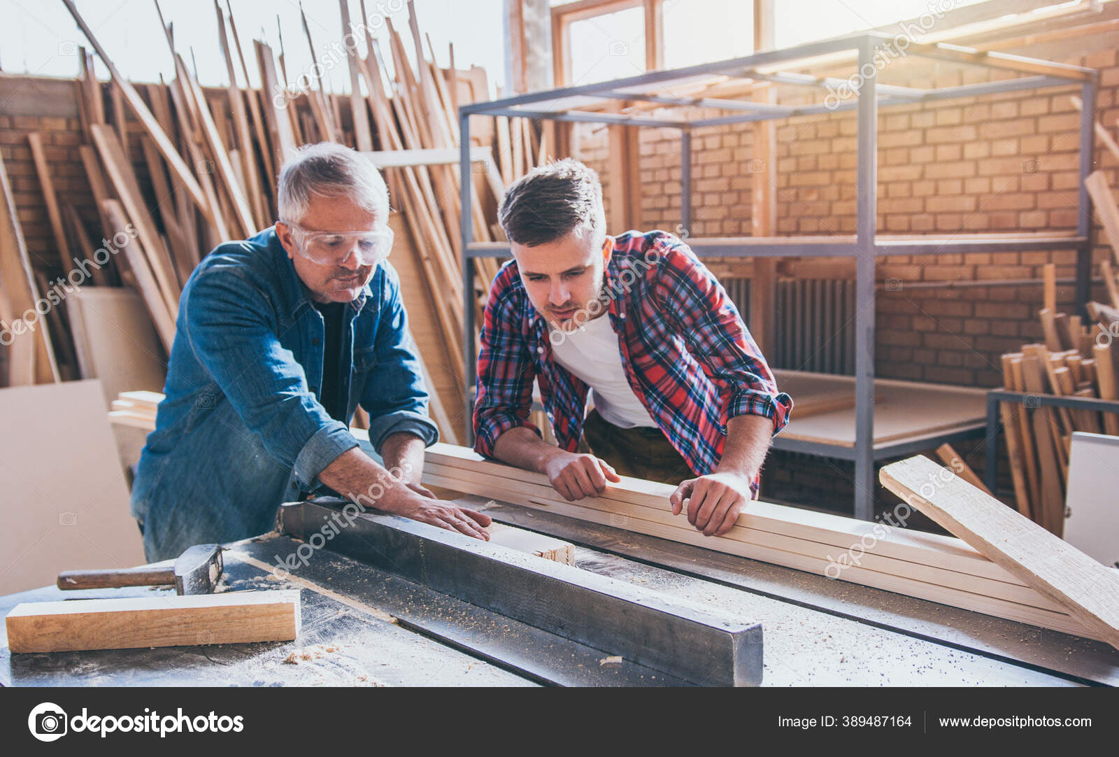 Carpenters Using Circular Saw Workshop Stock Photo by ©karanovimages ...