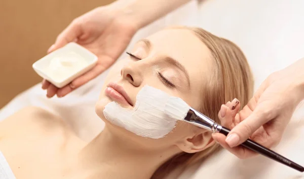Spa facial mask application. Spa beauty organic facial mask application ...