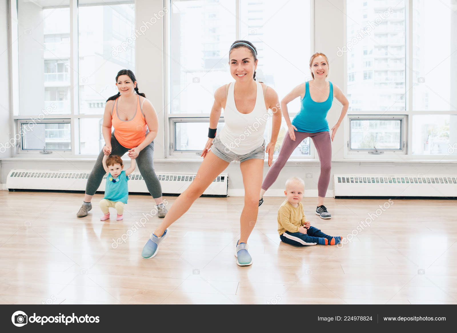 Group Three Young Women Children Doing Workout Gym Class Instructor ⬇ ...