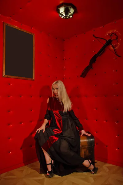 Pretty Young Sexy Blonde Gothic Dress Interior Medieval Red Room Stock