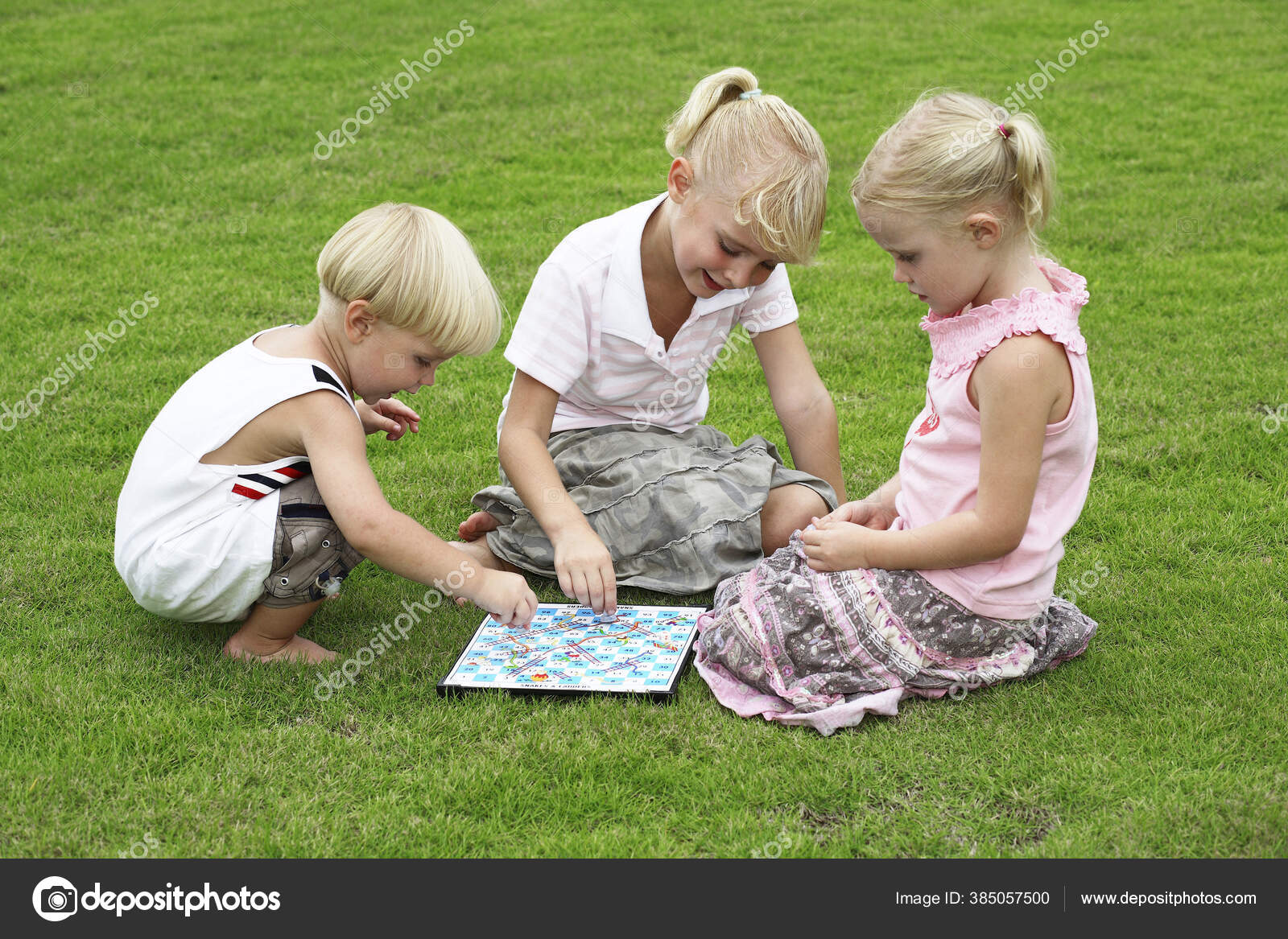 Children Playing Board Game Stock Photo by ©image_hit 385057500