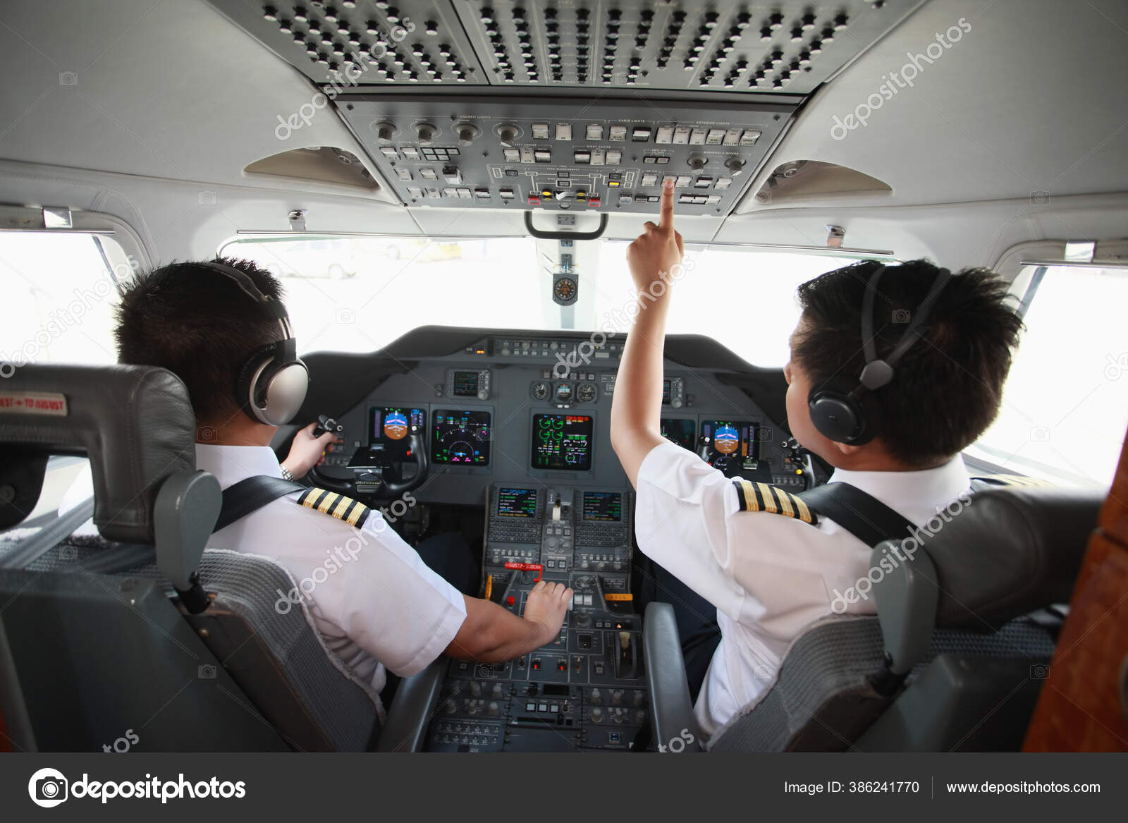Pilot Pilot Private Jet Cockpit — Stock Photo © image_hit #386241770