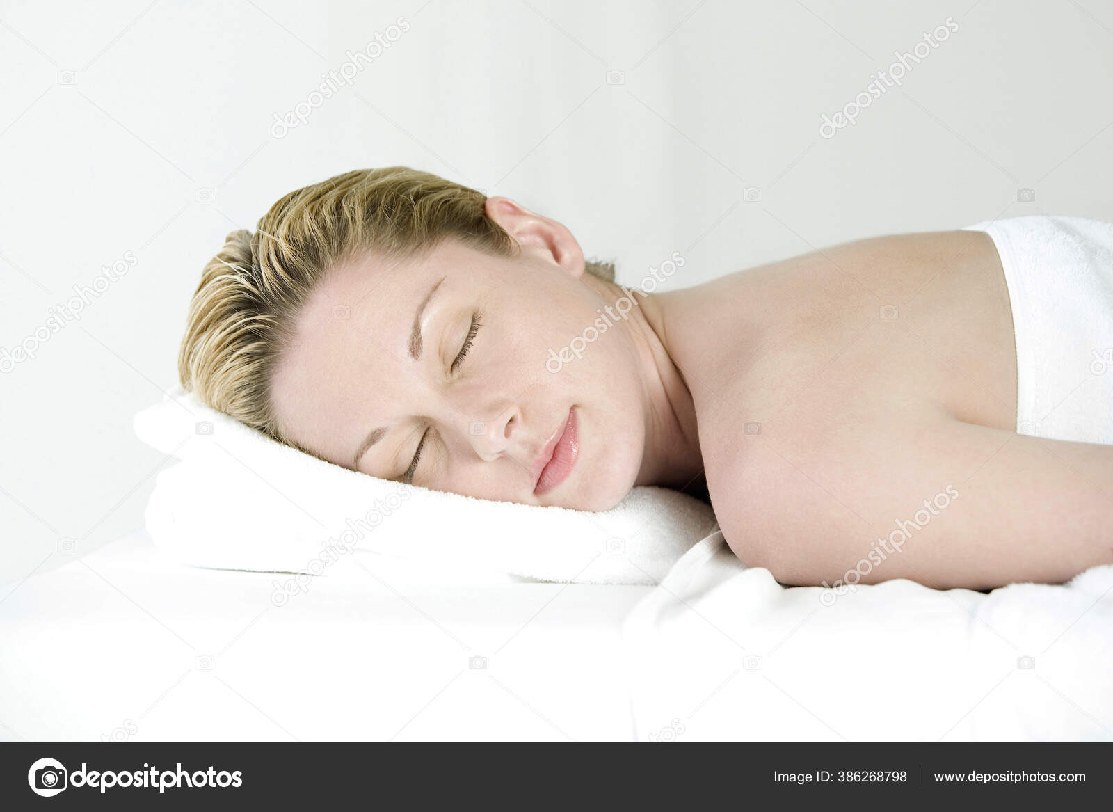 Woman Lying Forward Massage Table Her Eyes Closed — Stock Photo © image ...