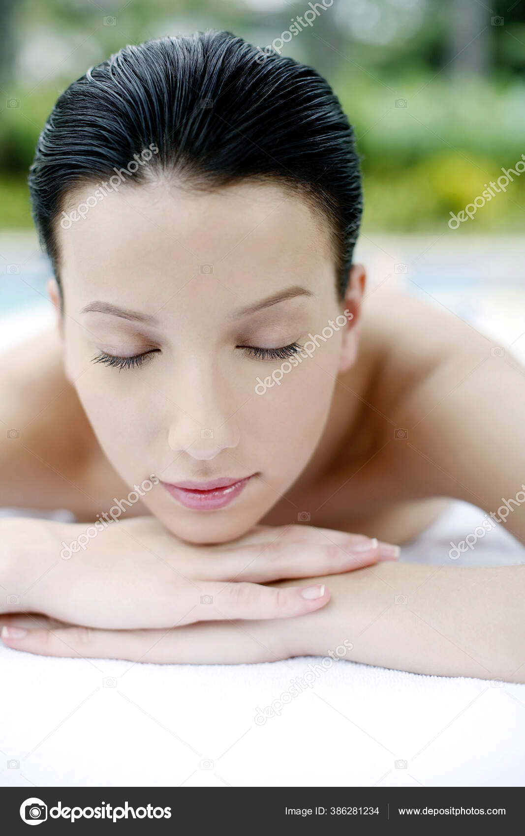 Woman Lying Forward Massage Table Her Eyes Closed — Stock Photo © image ...