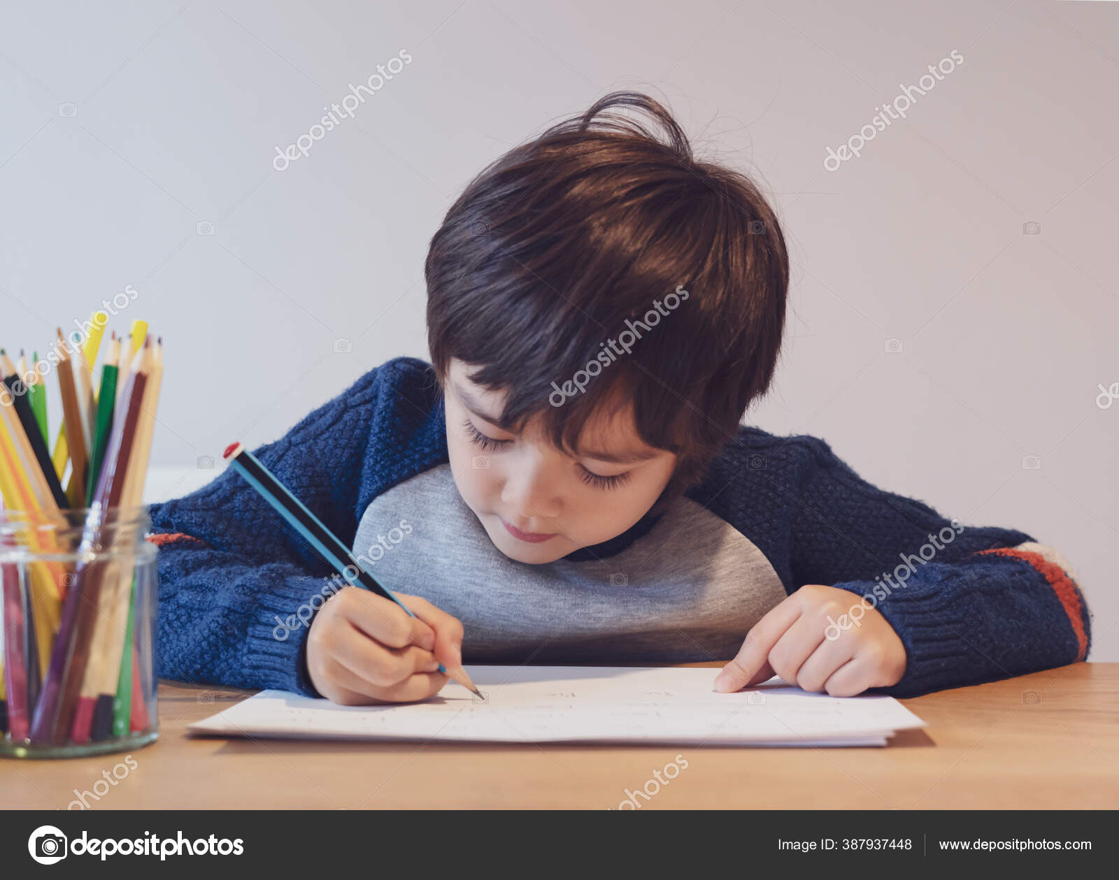 Happy Child Doing Homework