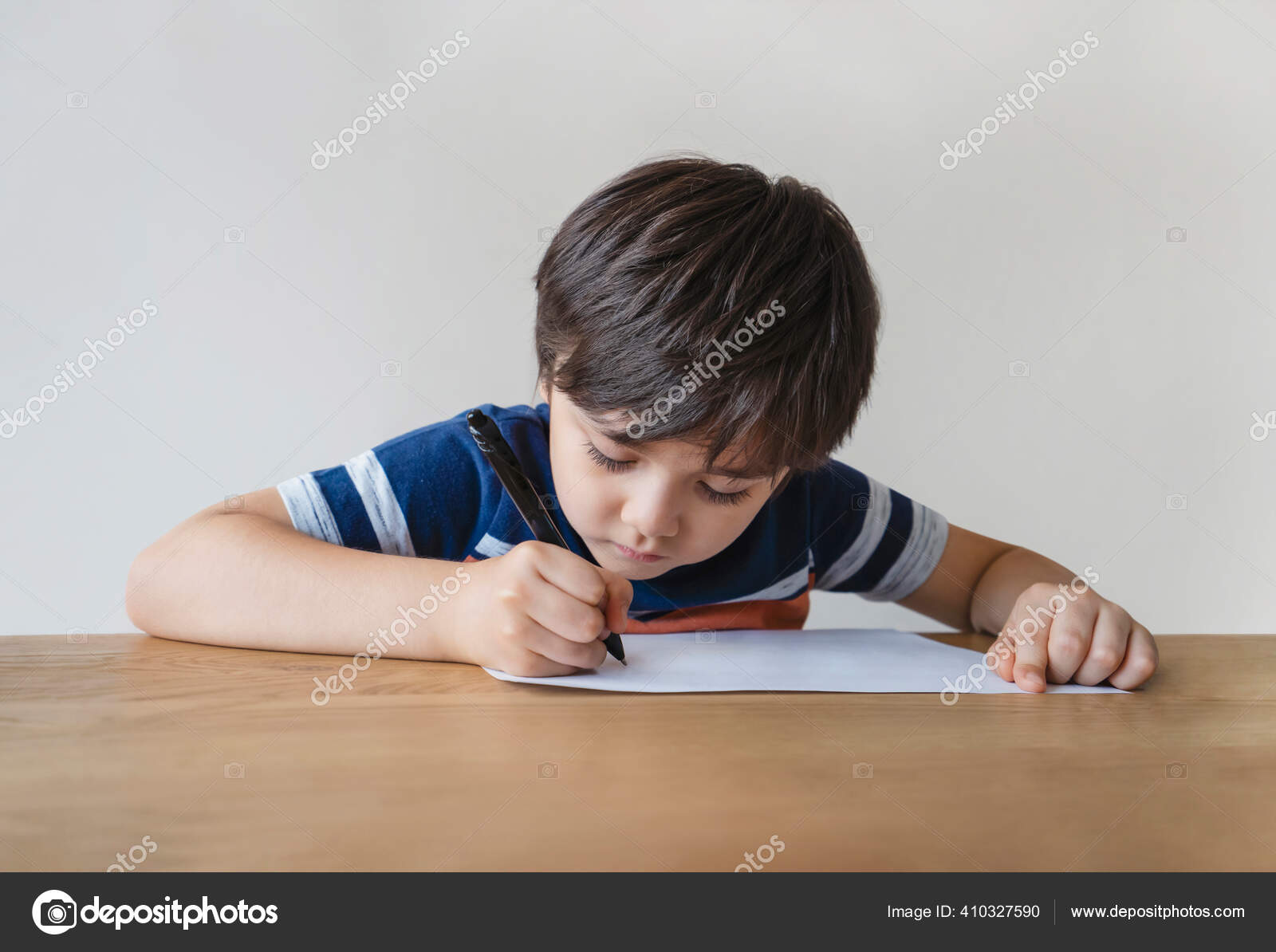 Portrait School Kid Sitting Alone Doing Homework Child Boy Holding ...