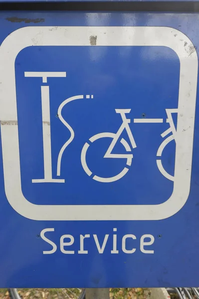 señal de la estación de autoservicio de bicicleta, pictograma blanco y ...