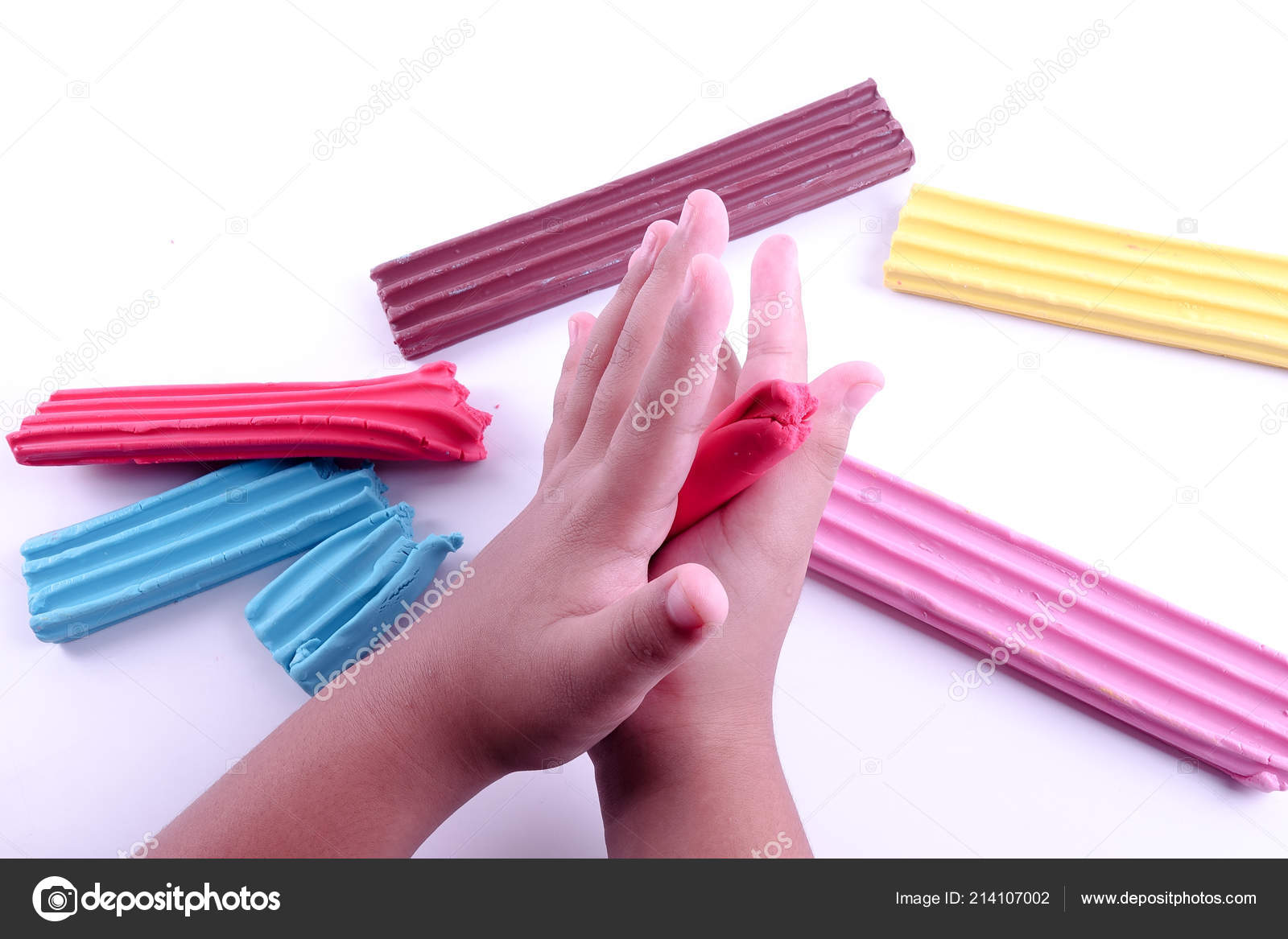 Child Hands Playing Colorful Clay Stock Photo by ©tuahlensa 214107002