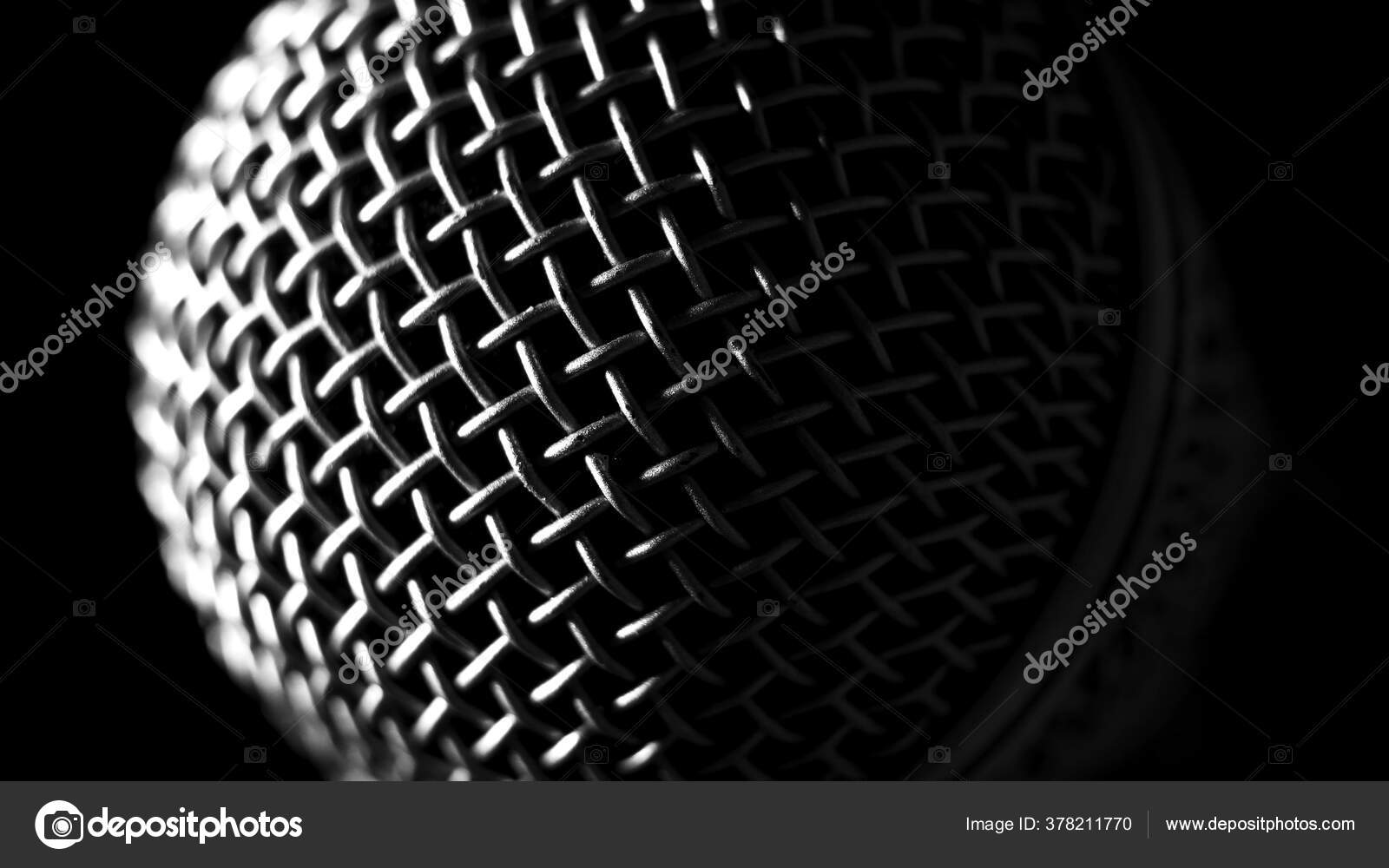 Macro shot of a stage mic professional vocal microphone - low key ...