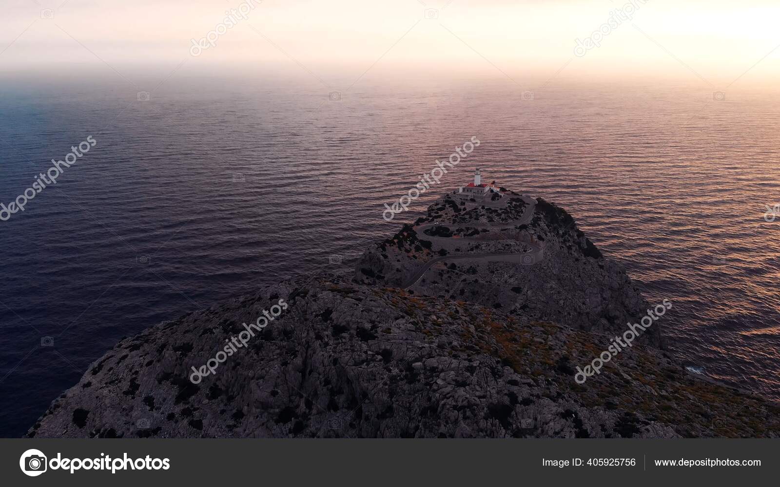 Lantern Cap de Formentor, pink colored sunrise over Lighthouse At Cape ...