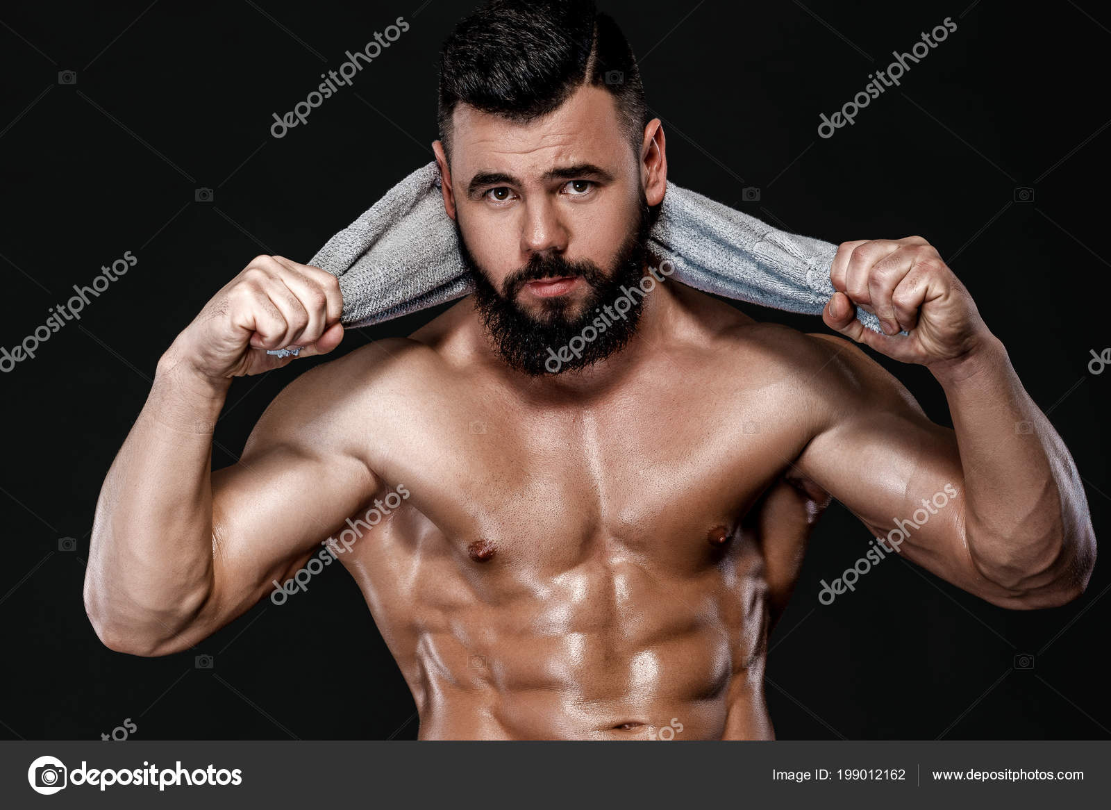 Strong bodybuilder with towel Stock Photo by ©erstudio 199012162