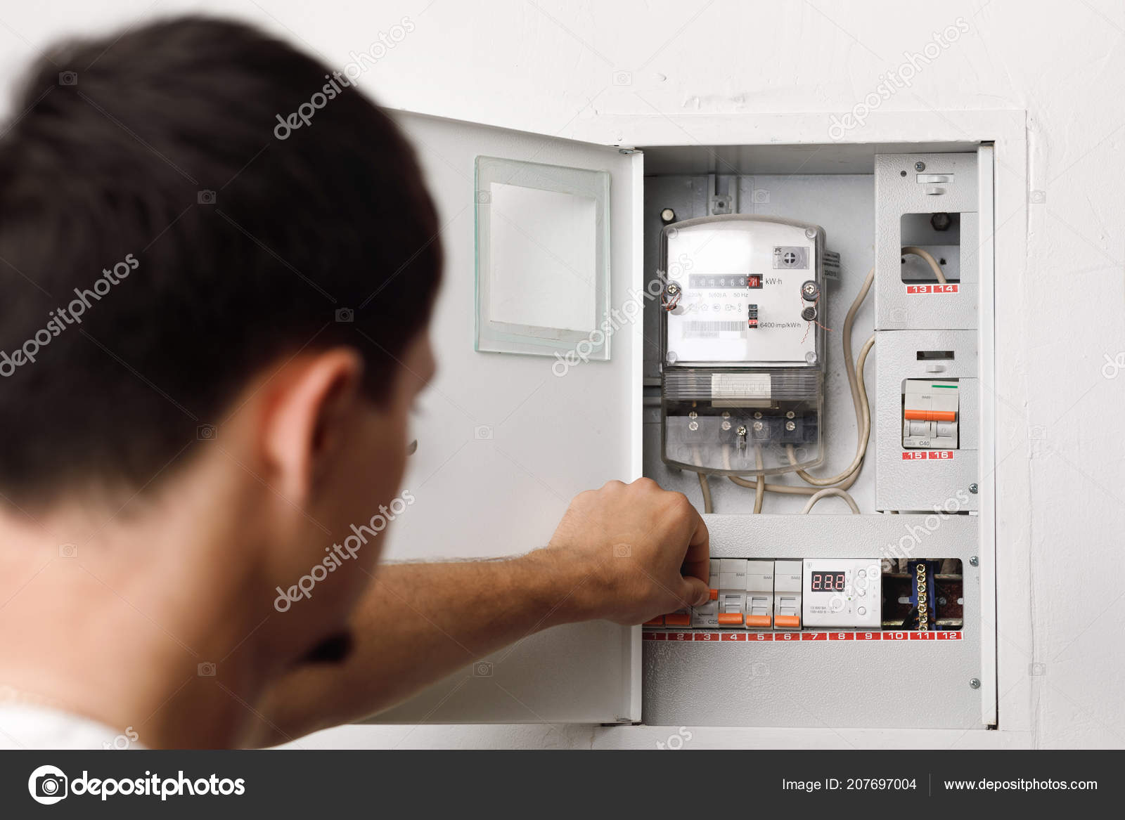 Electrical terminal box. man turn on or off — Stock Photo © erstudio ...
