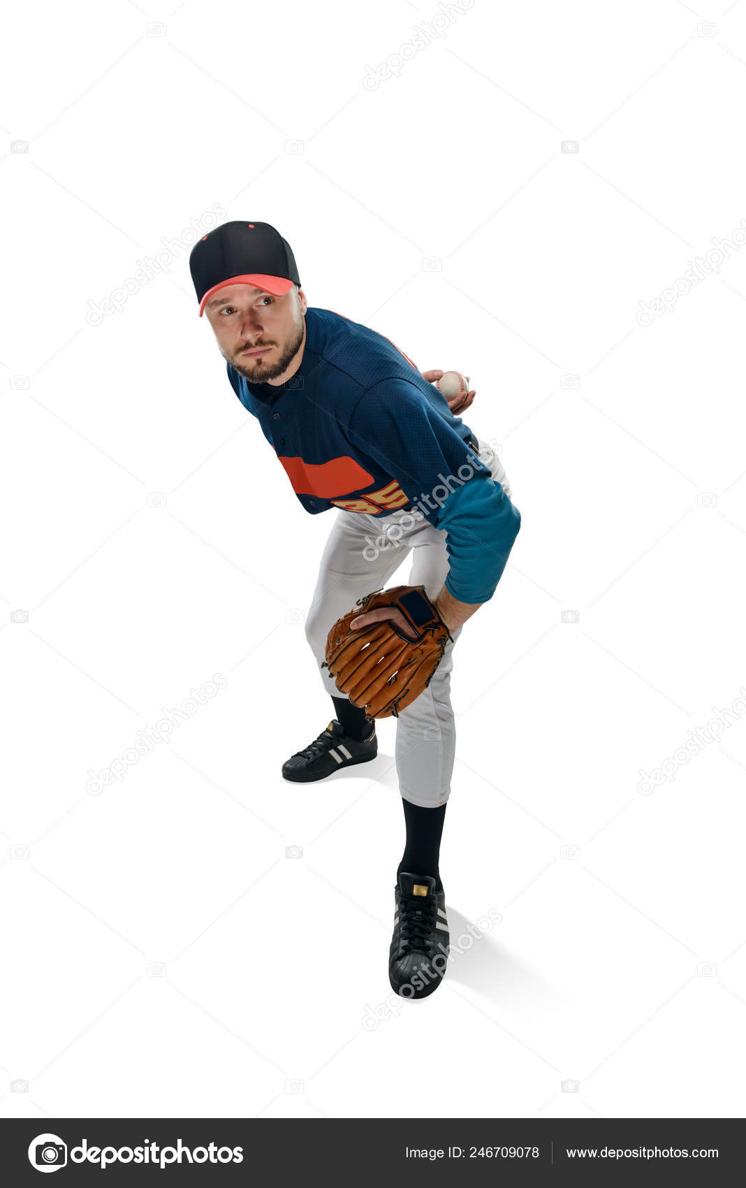 Young guy pitching a ball — Stock Photo © YGphoto #246709078