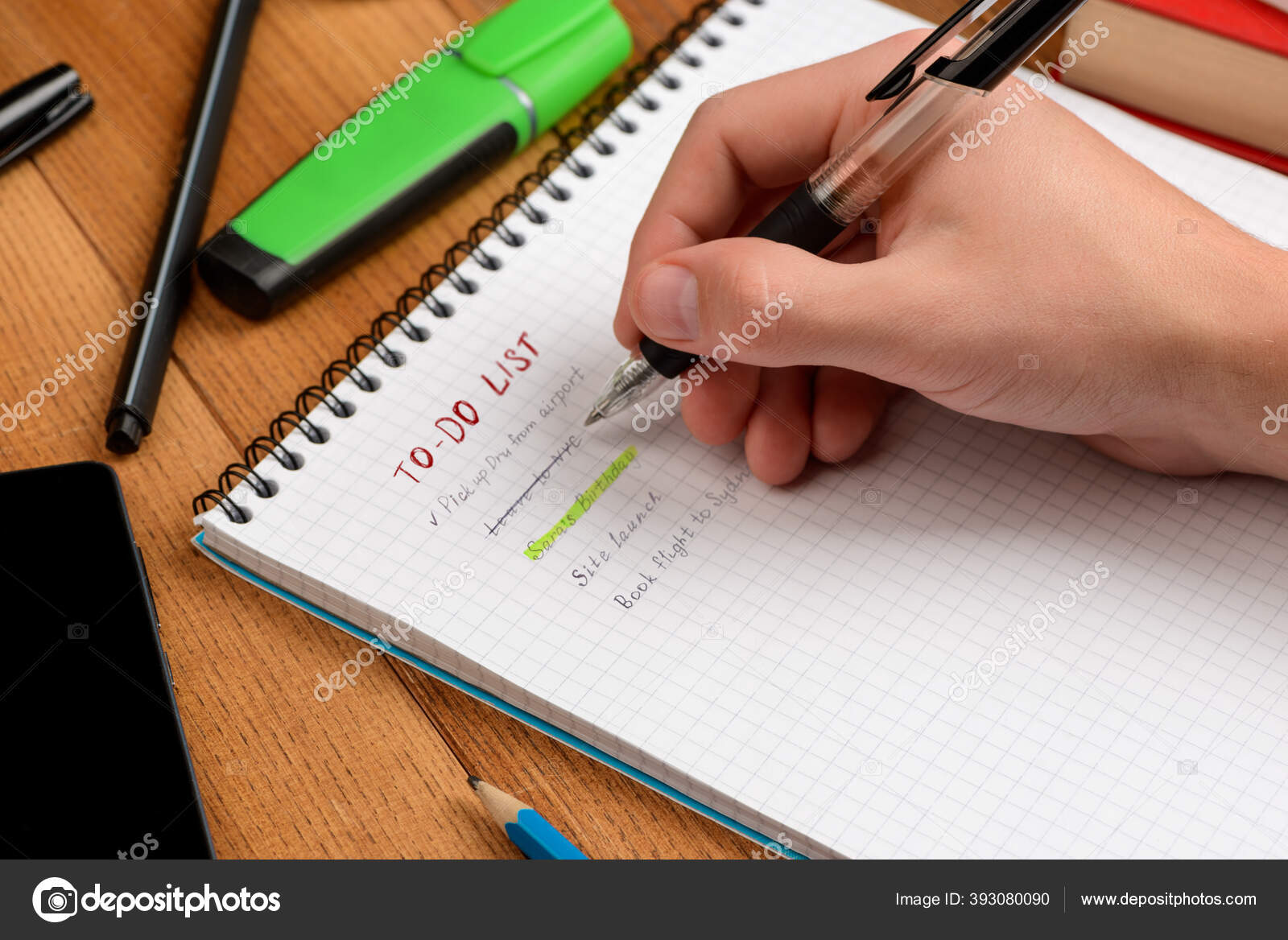 Making a to do list. Writing tasks and reminders Stock Photo by ...