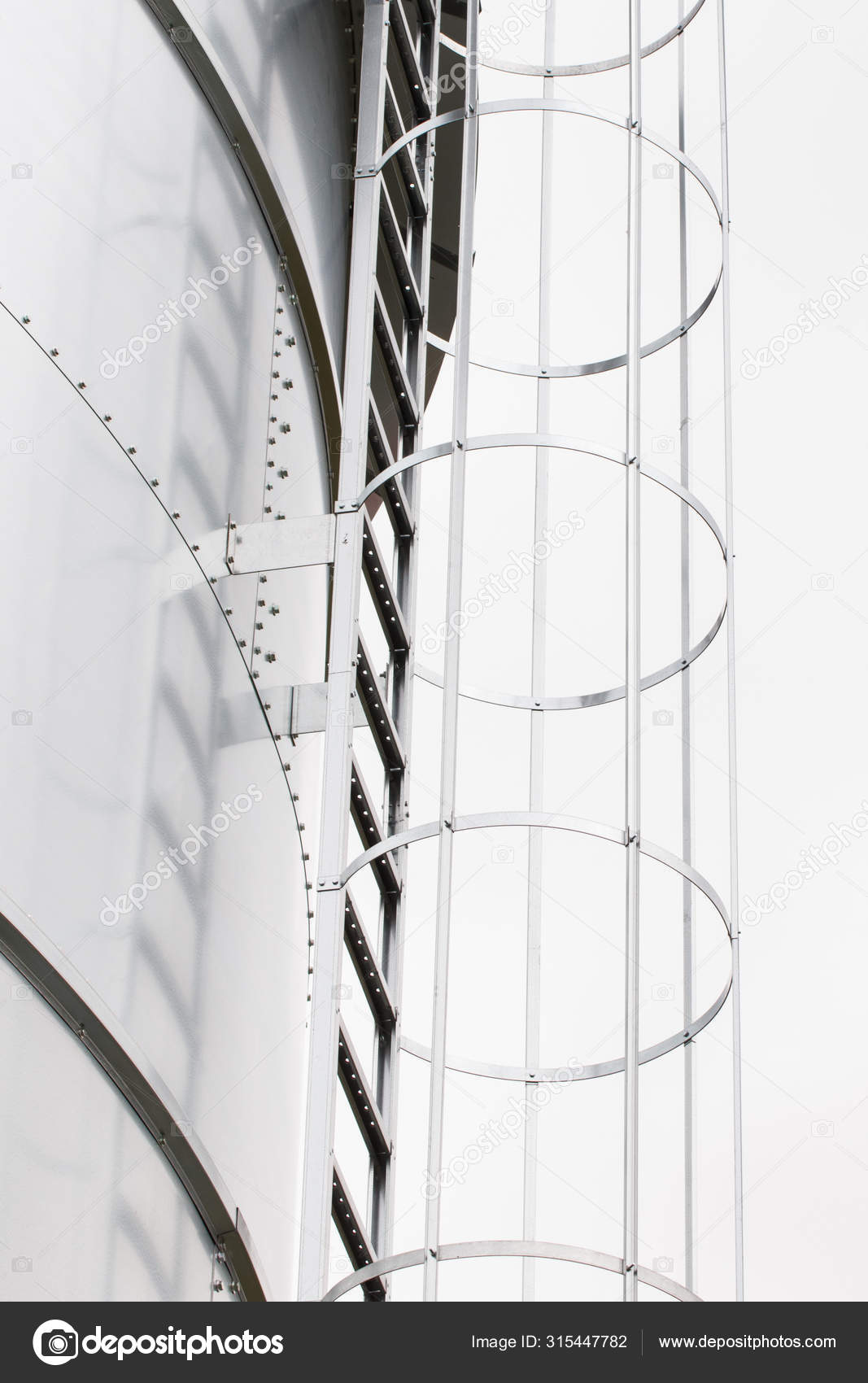 Ladder on silo for storage grain after harvest, detail of agricultural ...