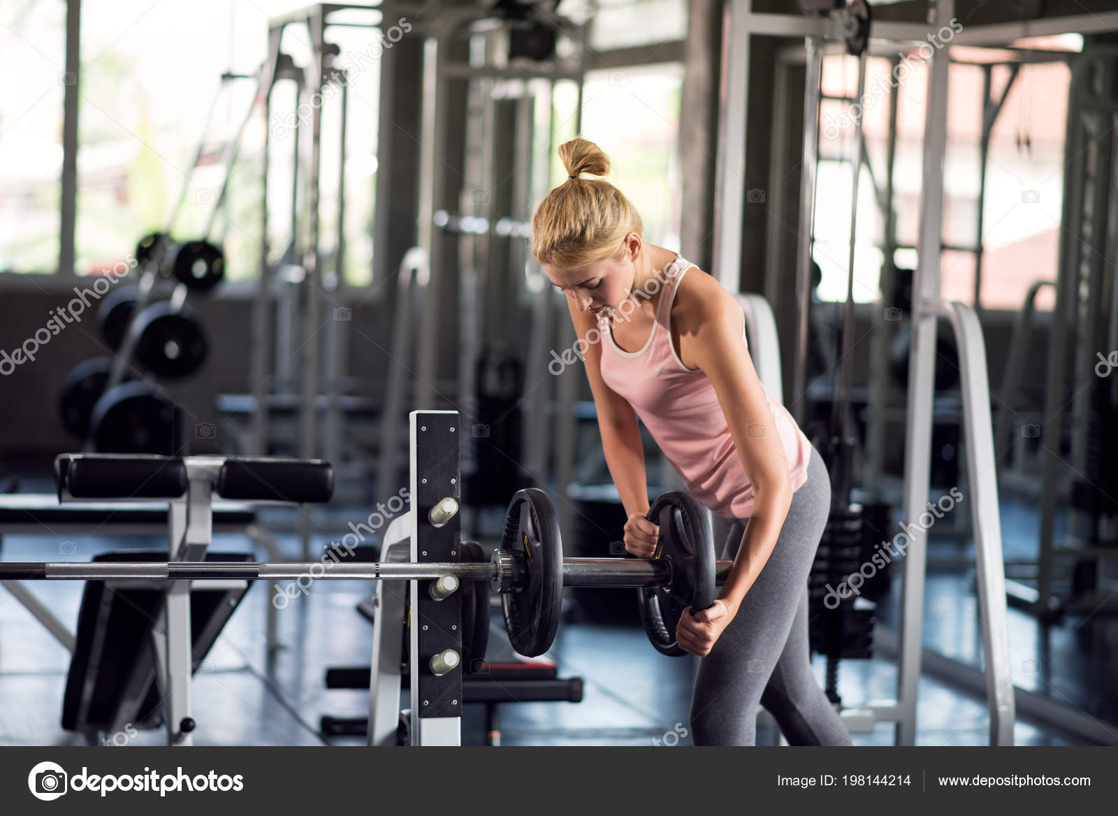 Strong Woman Exercising Iron Barbell Weight Plate Fitness Club Doing ...