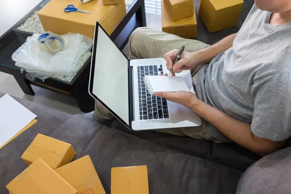 Startup small business SME, entrepreneur owner using smartphone - Stock ...