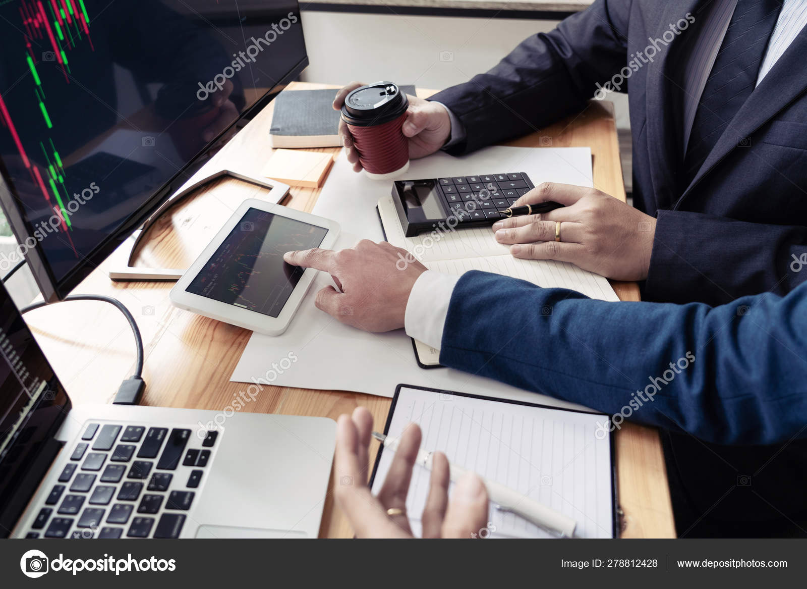 Team Stockbrokers Discussing Display Screens Analyzing Data Graphs ...