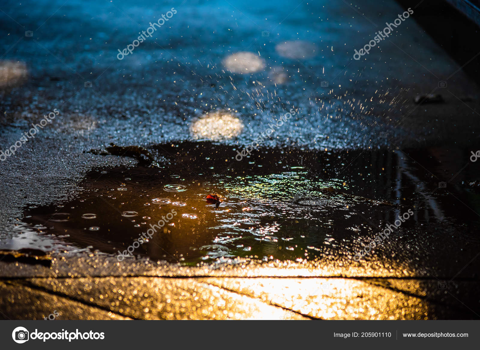 Image Raindrops Splash Road Surface Stock Photo by ©coffmancmu 205901110
