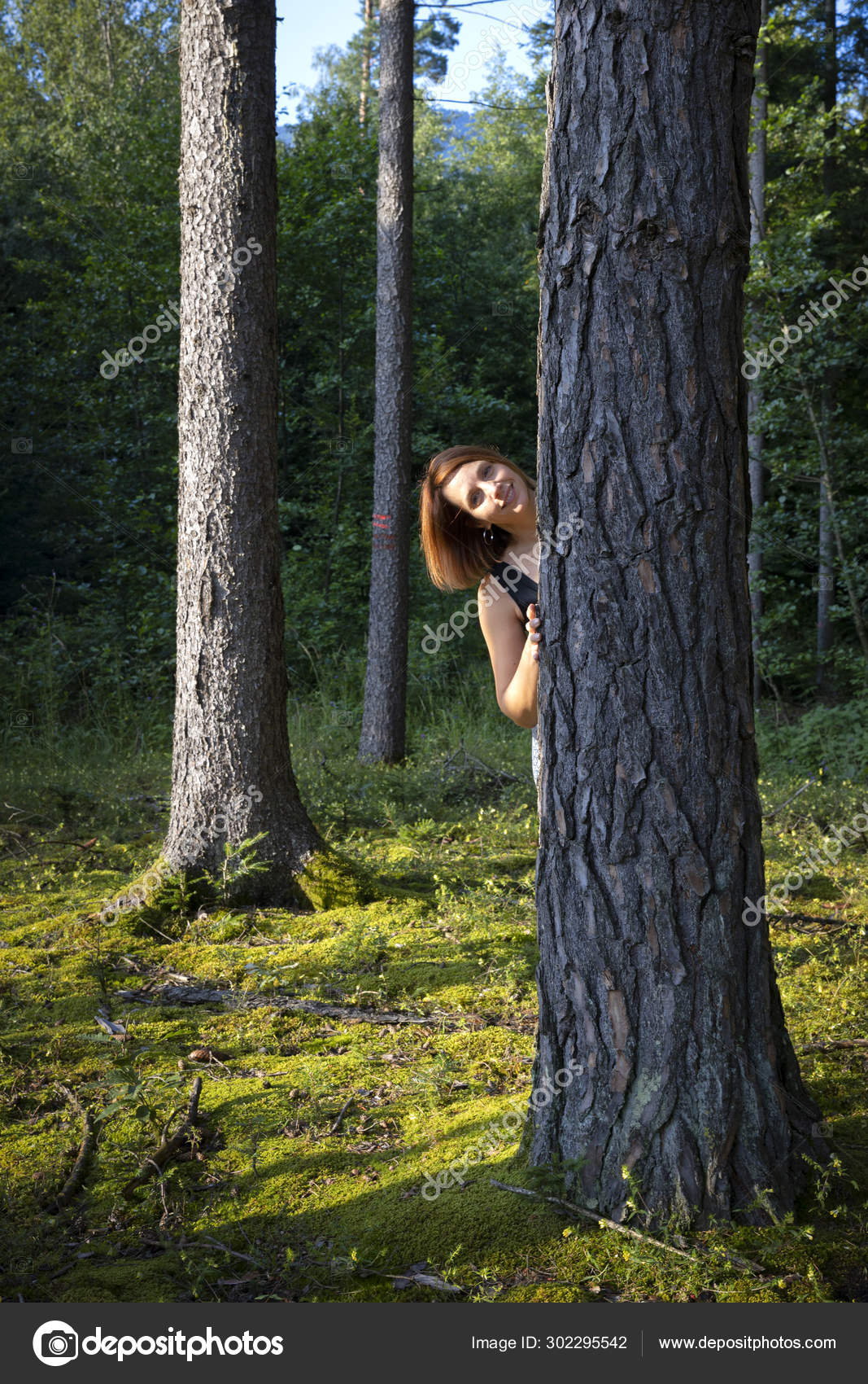 Active woman having a daily walk into the forest. Take care of y ...