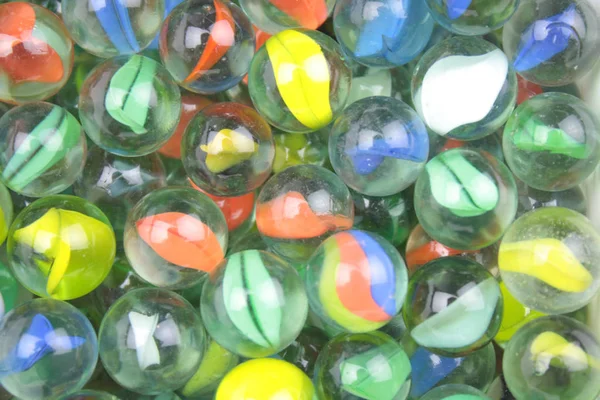 Glass marbles in container Stock Photos, Royalty Free Glass marbles in ...