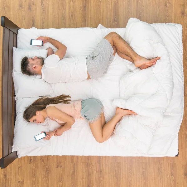 Couple phone bed Stock Photos, Royalty Free Couple phone bed Images ...