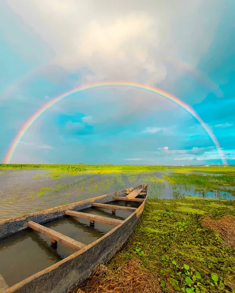 Rainbow over boat Stock Photos, Royalty Free Rainbow over boat Images ...