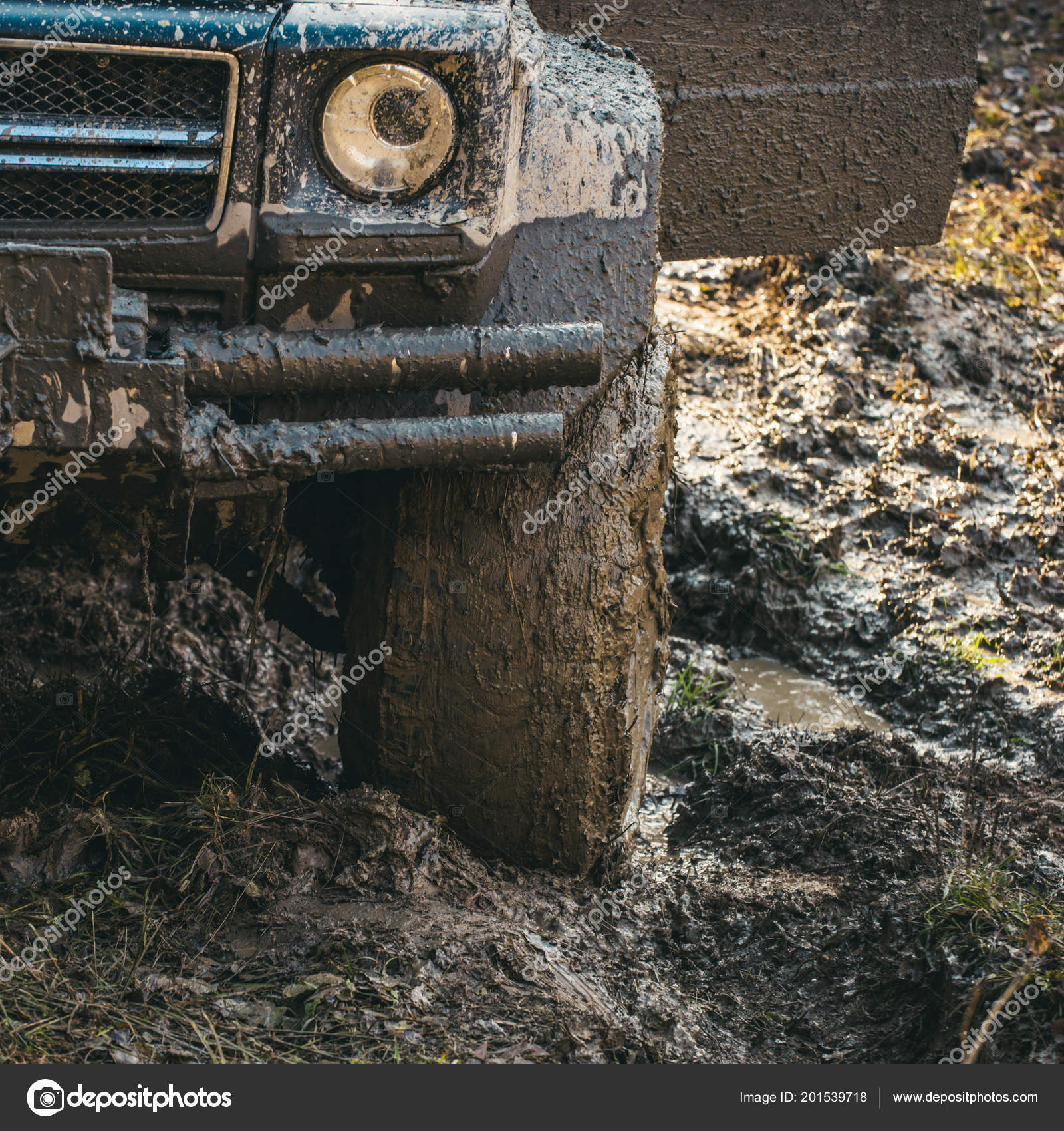 Dirty offroad tire covered with mud. Wheel in deep rut — Stock ...