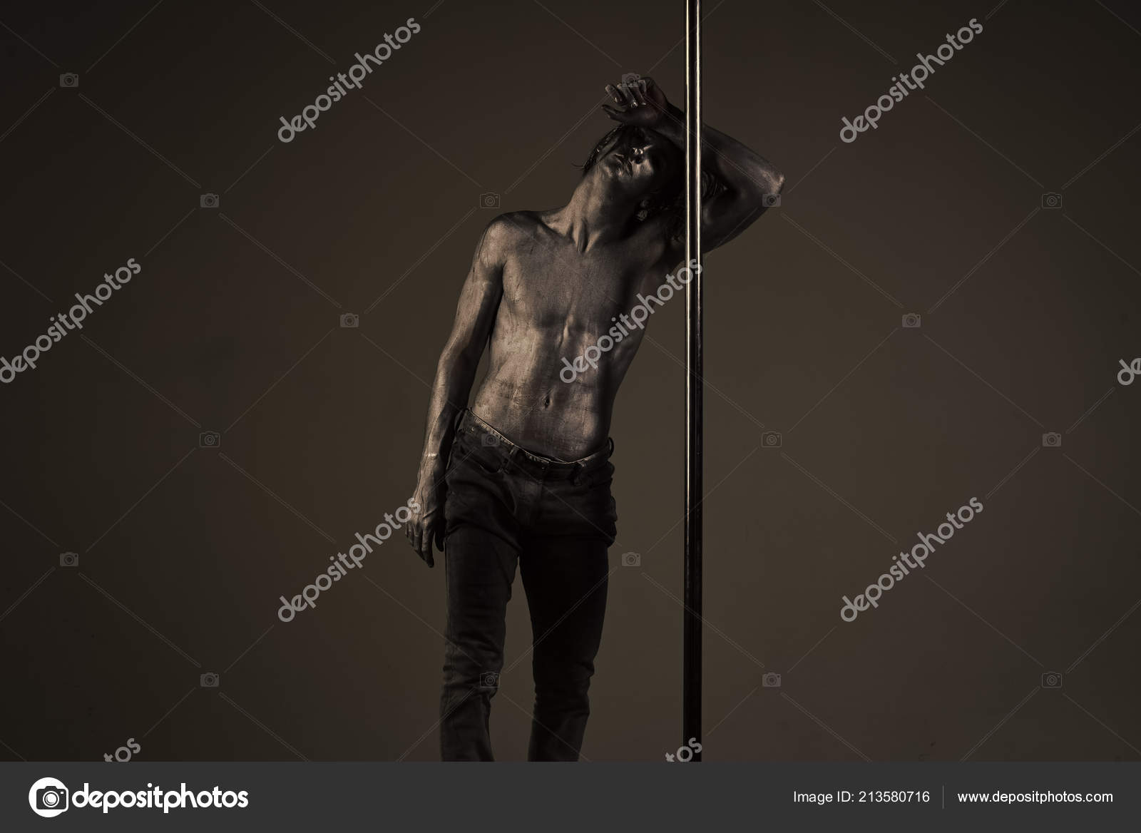 Tired dancer concept. Guy lean on metallic pole. Stock Photo by ...