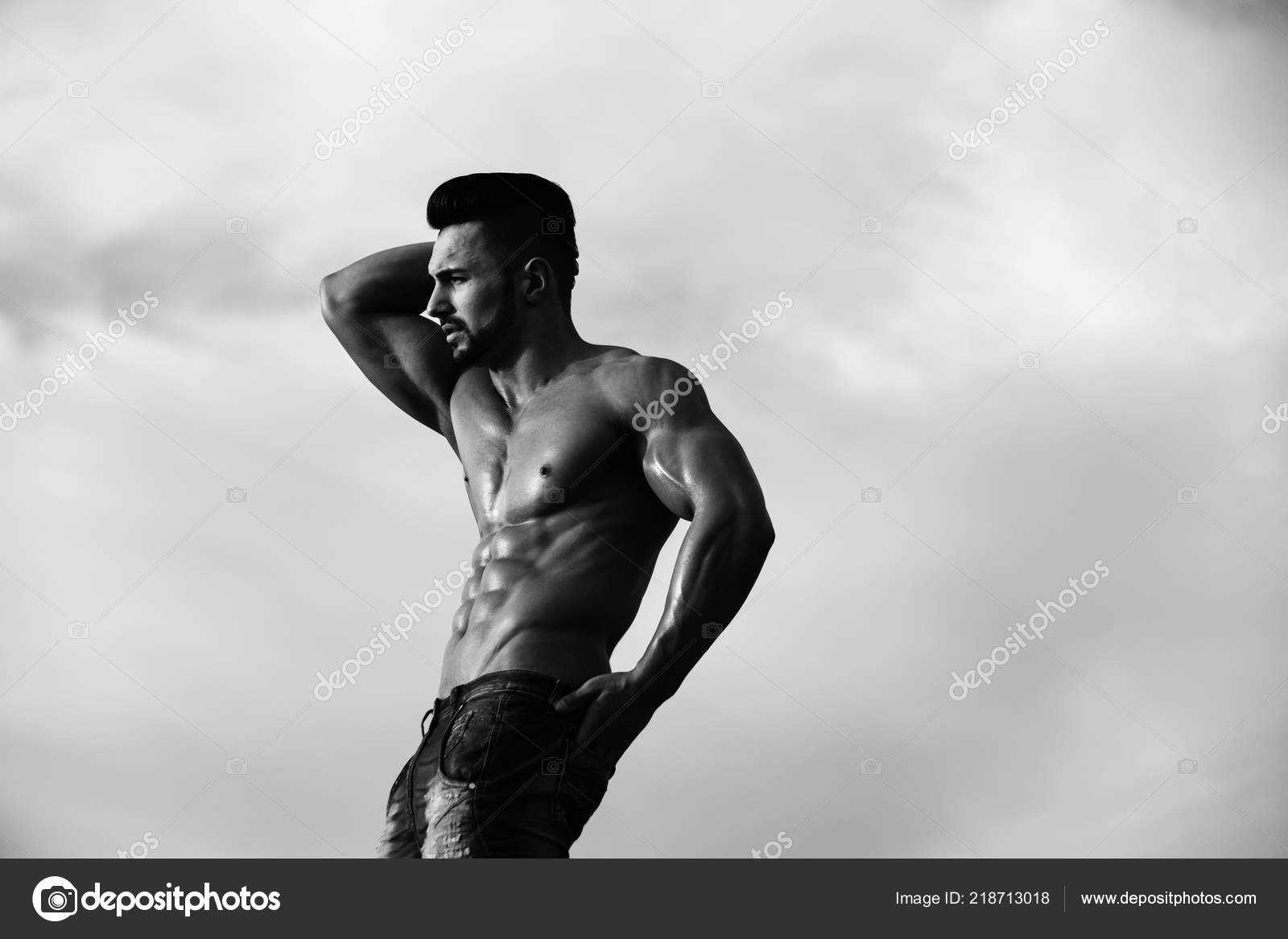 Muscular man with muscle torso sunny day on blue sky Stock Photo by ...