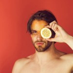 Facial man mask from fruits and clay . Face mud applied. Stock Photo by ...